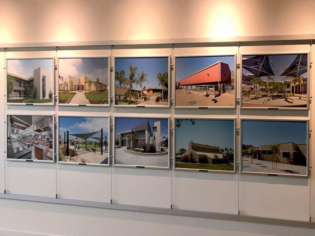 Framed Display with Rail-Track Tensioned Suspended Cables