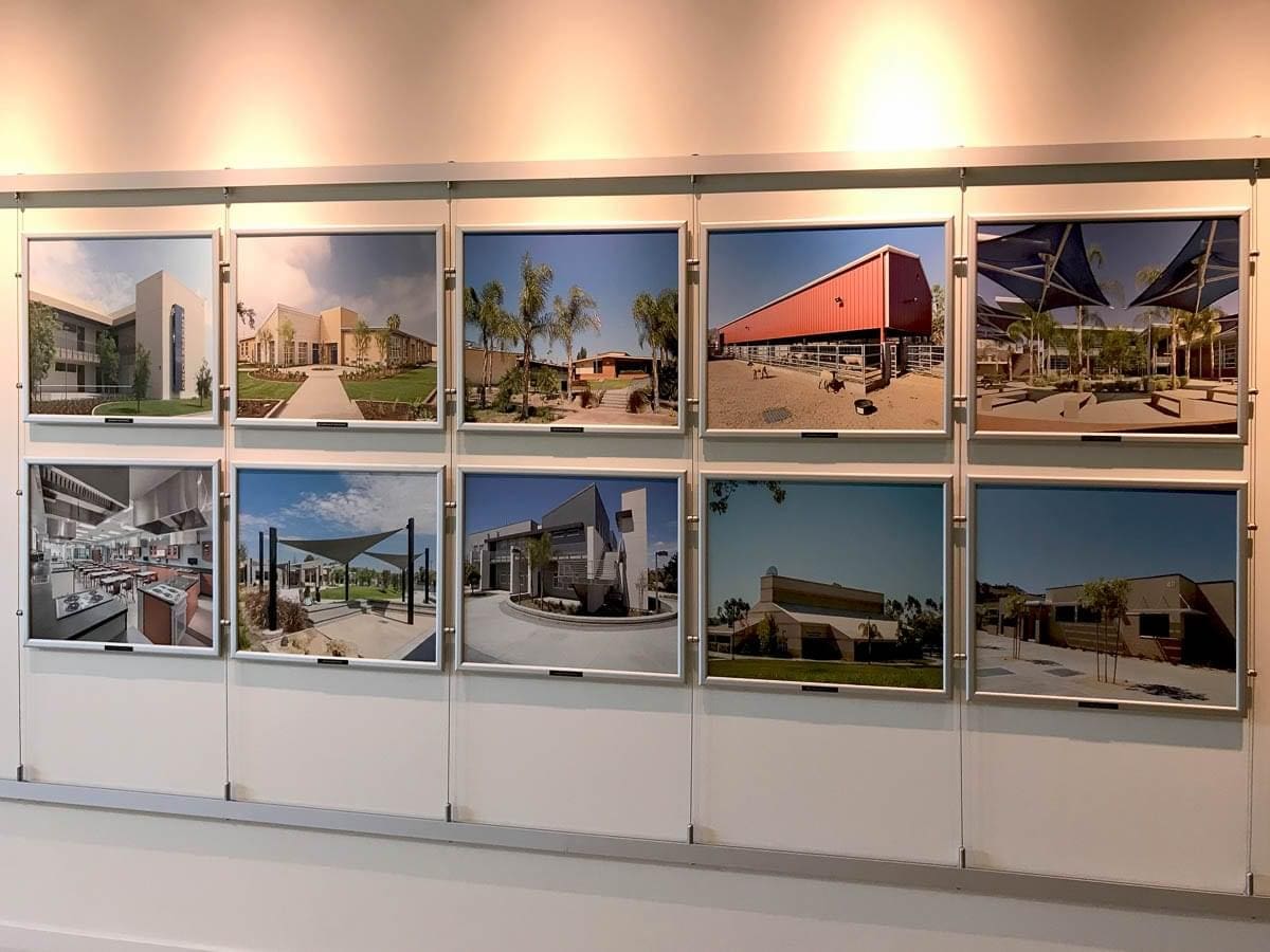 Framed Display with Rail-Track Tensioned Suspended Cables